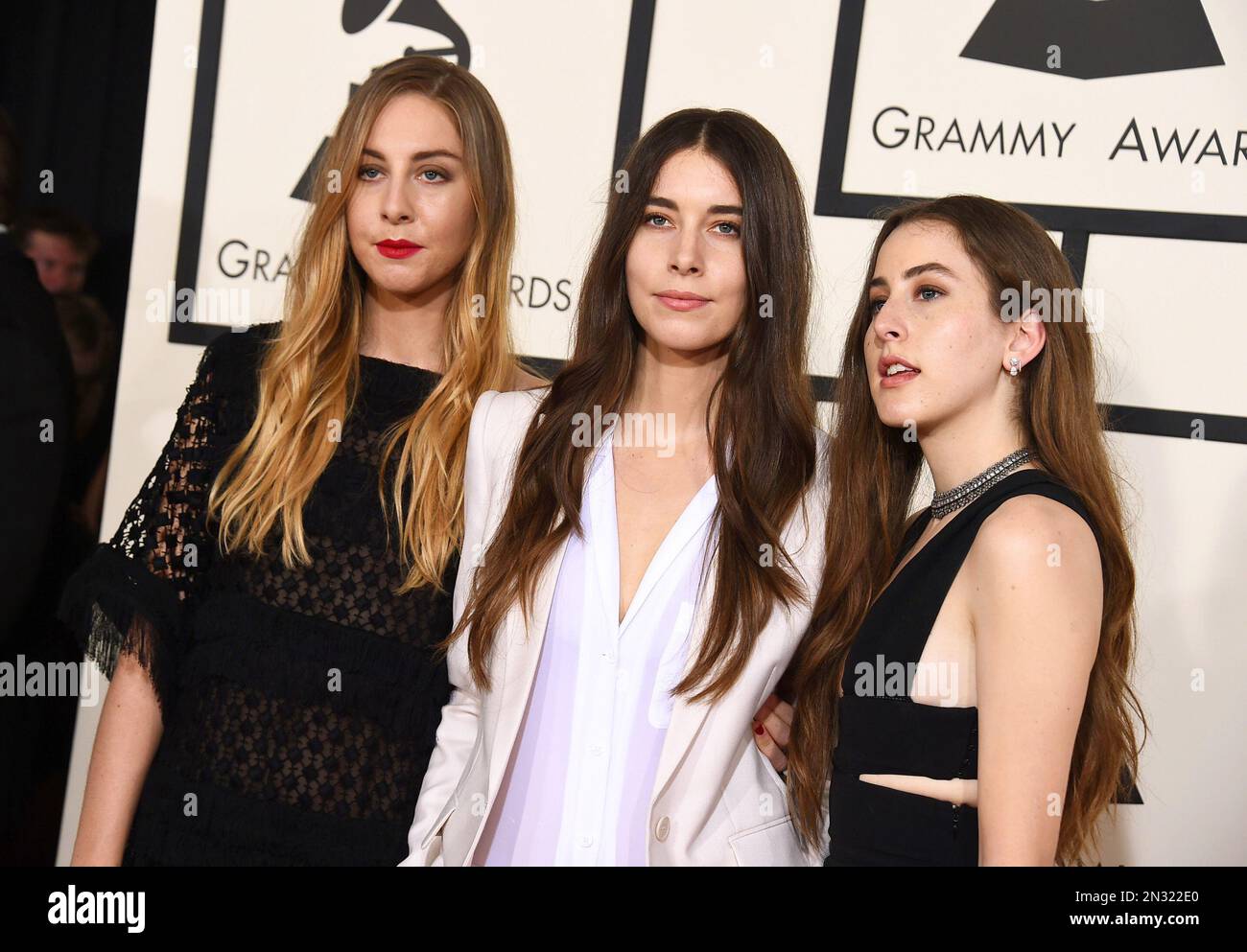 Este Haim, from left, Danielle Haim, and Alana Haim of Haim arrive at ...