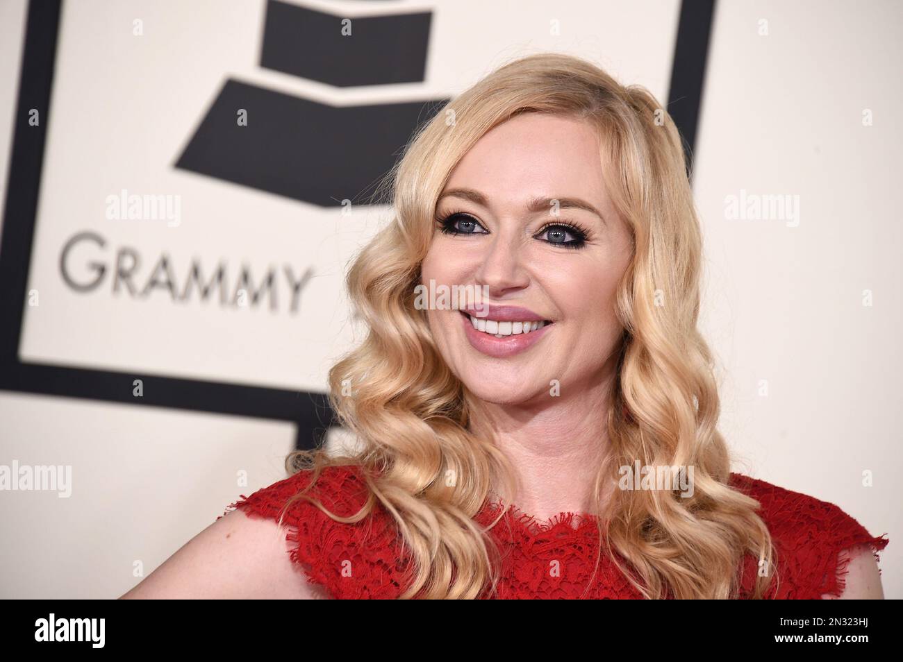 Isabel Adrian arrives at the 57th annual Grammy Awards at the Staples ...
