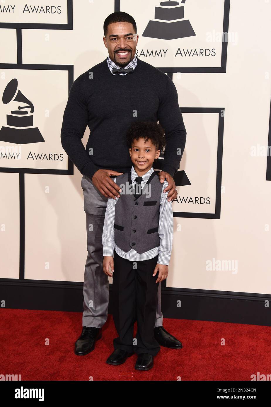 David Otunga, left, and David Otunga Jr. arrive at the 57th annual ...