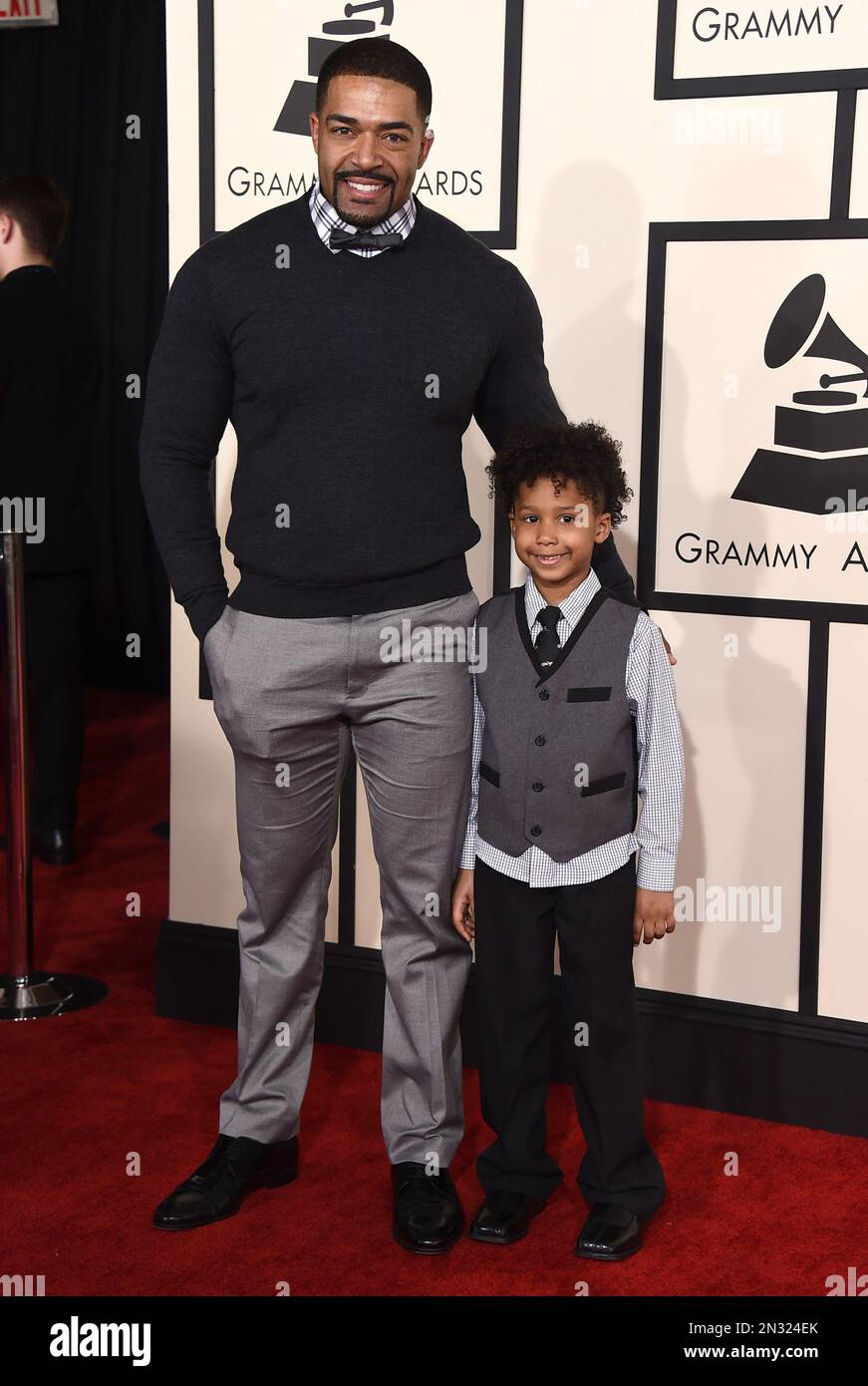 David Otunga, left, and David Otunga Jr. arrive at the 57th annual ...