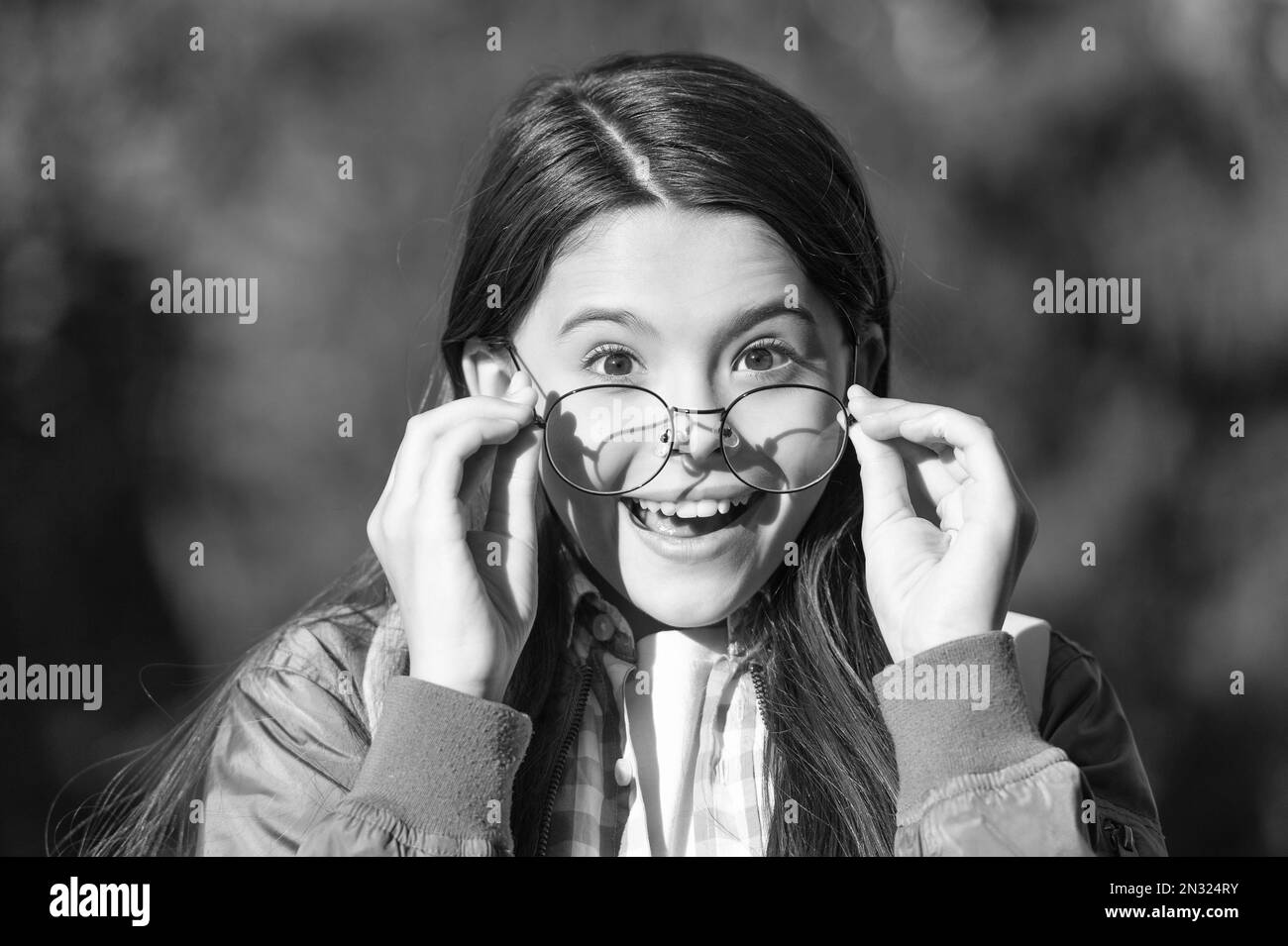 amazed kid with backpack wear glasses. back to school Stock Photo - Alamy