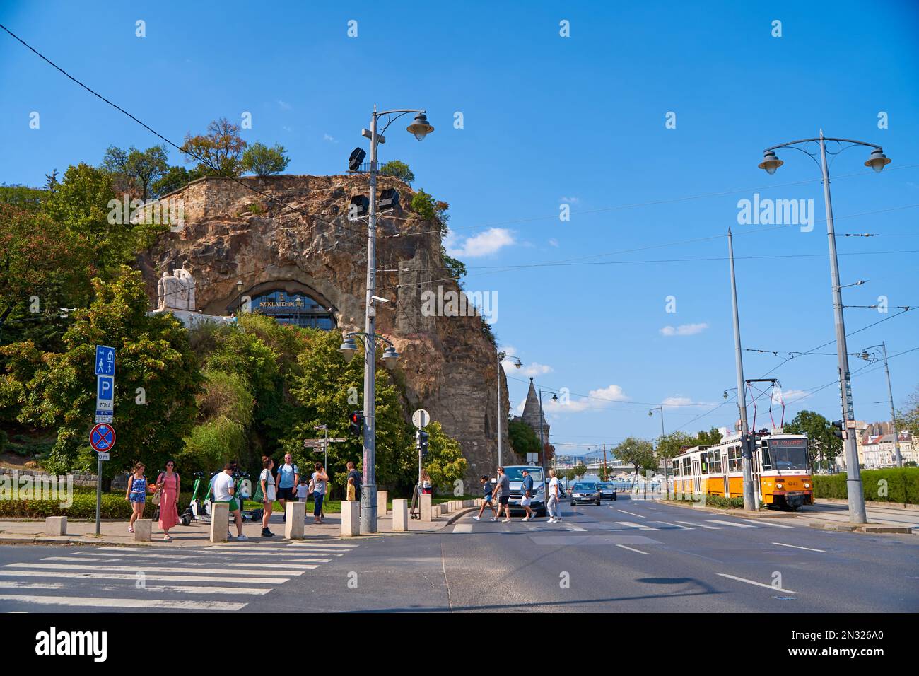 The building is carved into the rock and covered with glass. Modern ...