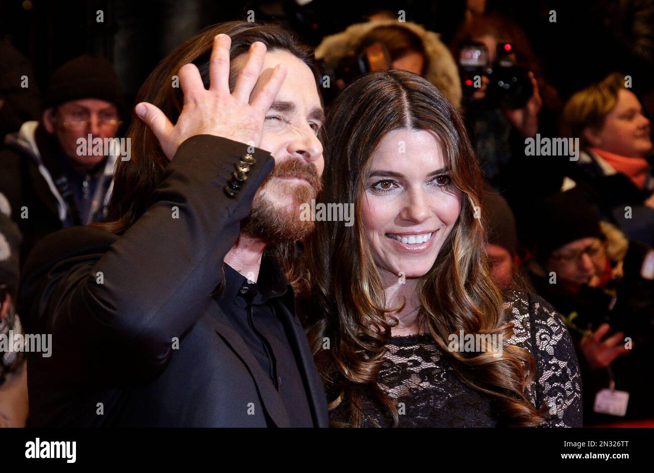 Actor Christian Bale, left, and his wife Sibi Blazic pose during the ...