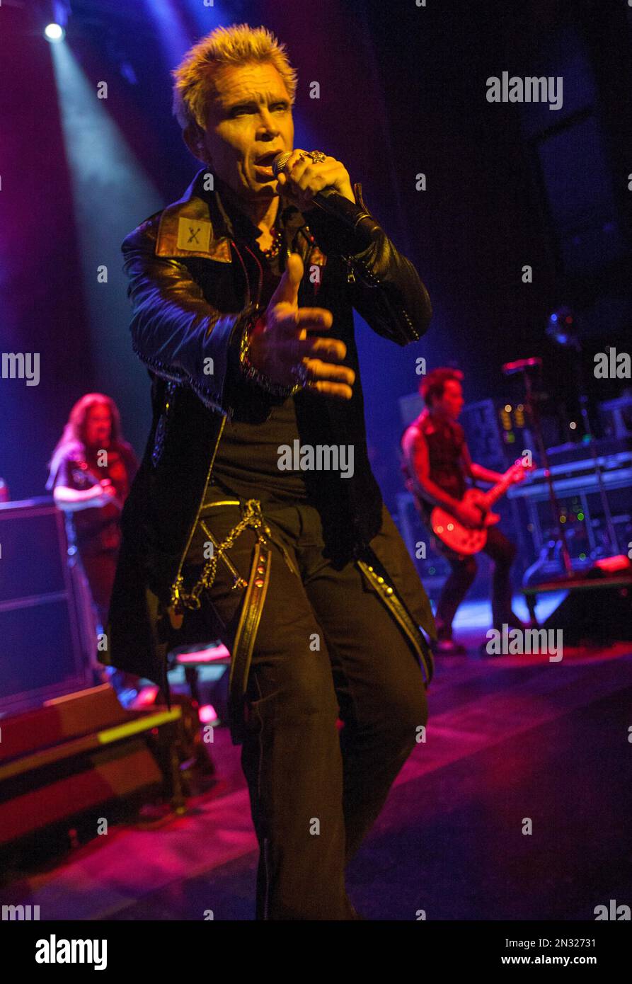Bass player Stephen McGrath, Billy Idol and Billy Morrison seen during ...