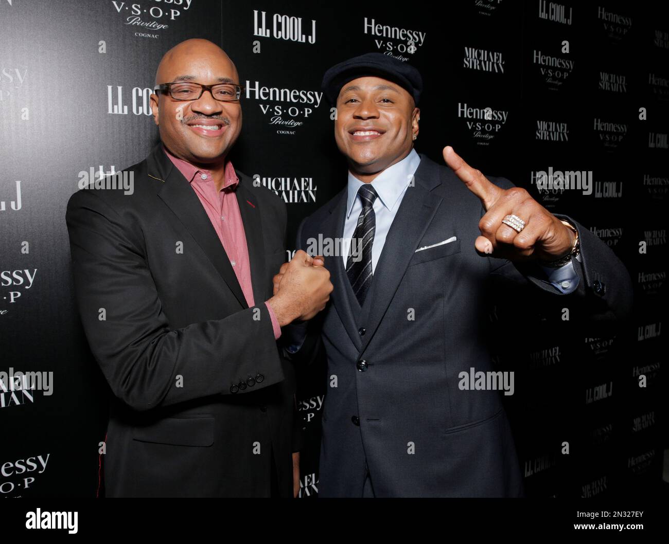 Hennessy Senior Vice President Rodney Williams and LL Cool J attend a ...