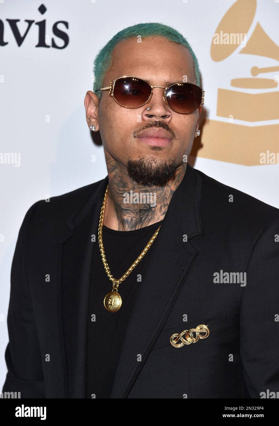Chris Brown arrives at the 2015 Clive Davis Pre-Grammy Gala at the ...