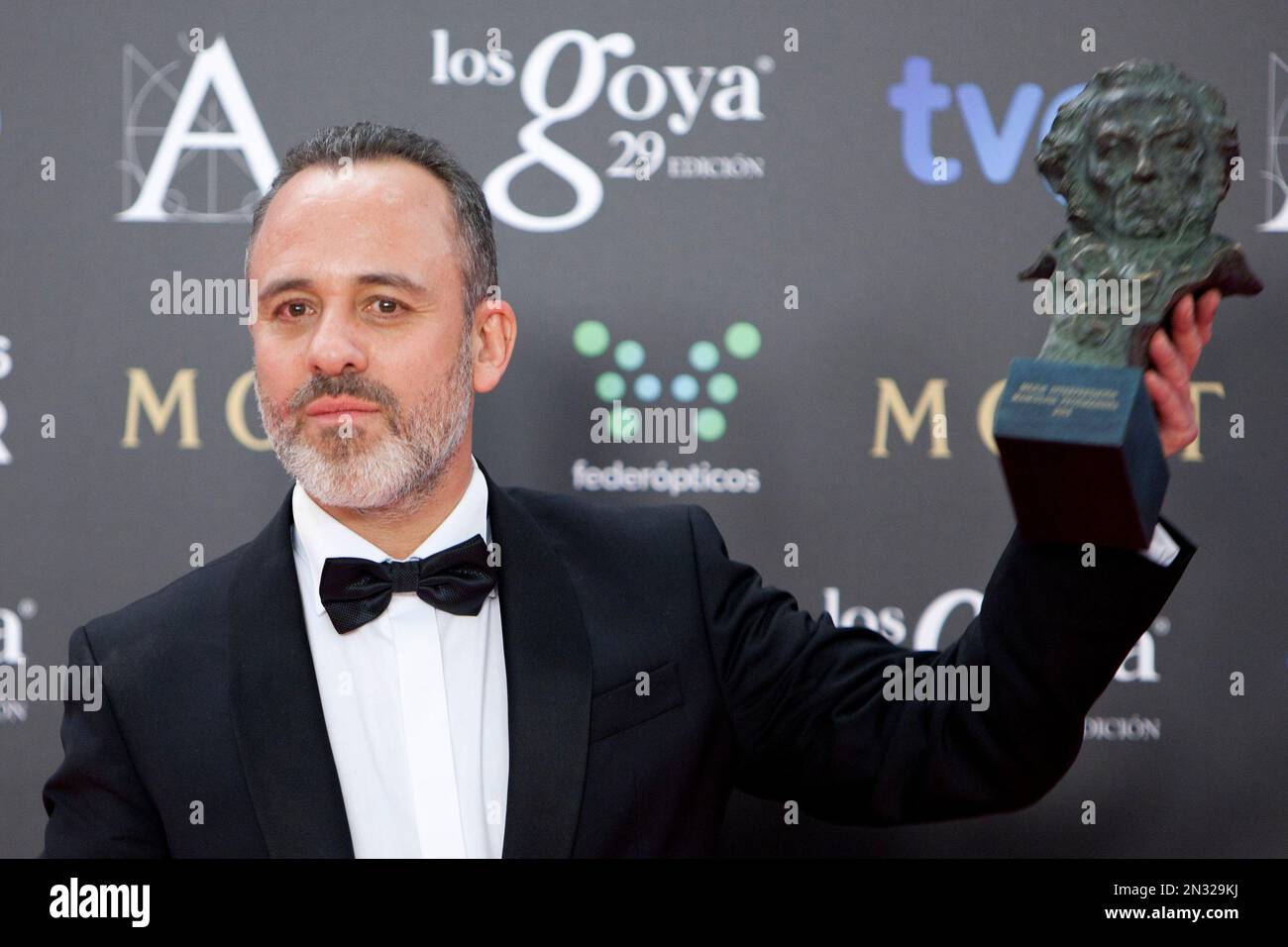Spanish actor Javier Gutierrez holds his Goya award after winning the ...