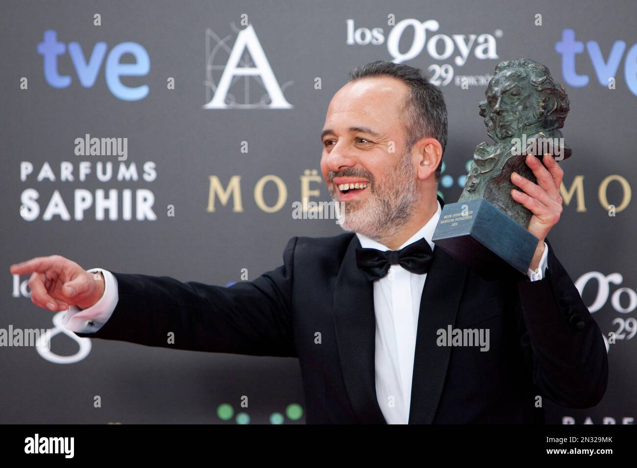 Spanish actor Javier Gutierrez holds his Goya award after winning the ...