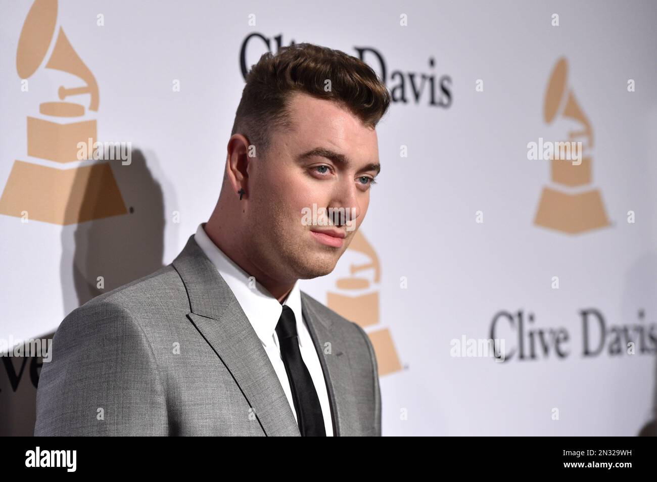 Sam Smith arrives at the 2015 Clive Davis Pre-Grammy Gala at the ...