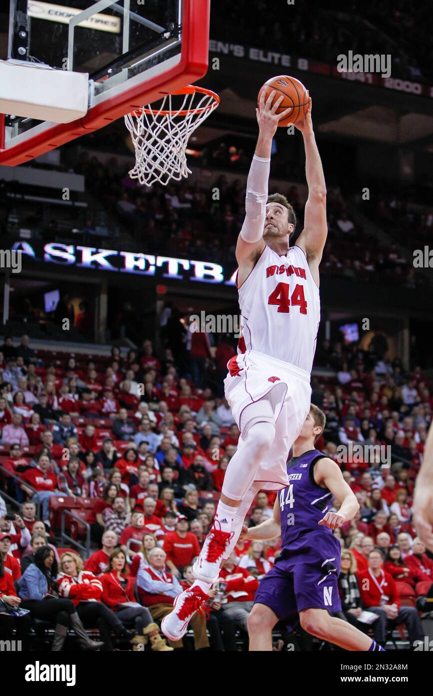 Wisconsin forward Frank Kaminsky against Northwestern's Gavin Skelly ...