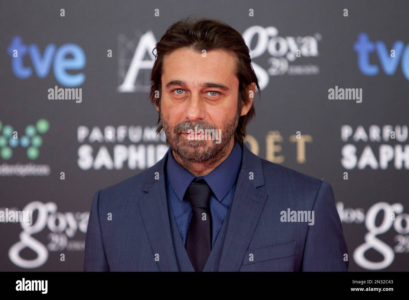 Spanish actor Jordi Moya poses for photographers on the red carpet ...