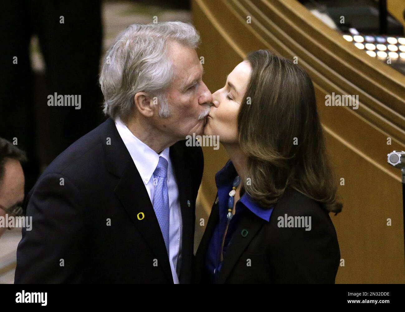 FILE - In this Jan. 12, 2015 file photo, Oregon Gov. John Kitzhaber kisses fiancee, Cylvia Hayes ...