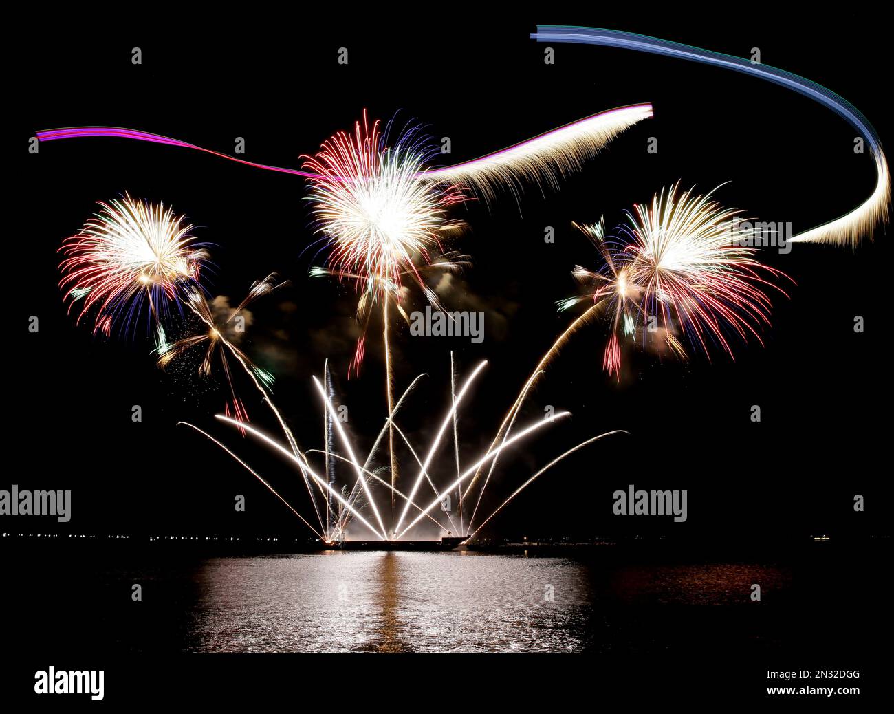 Fireworks from the Philippines light up the sky at the start of the 6th ...