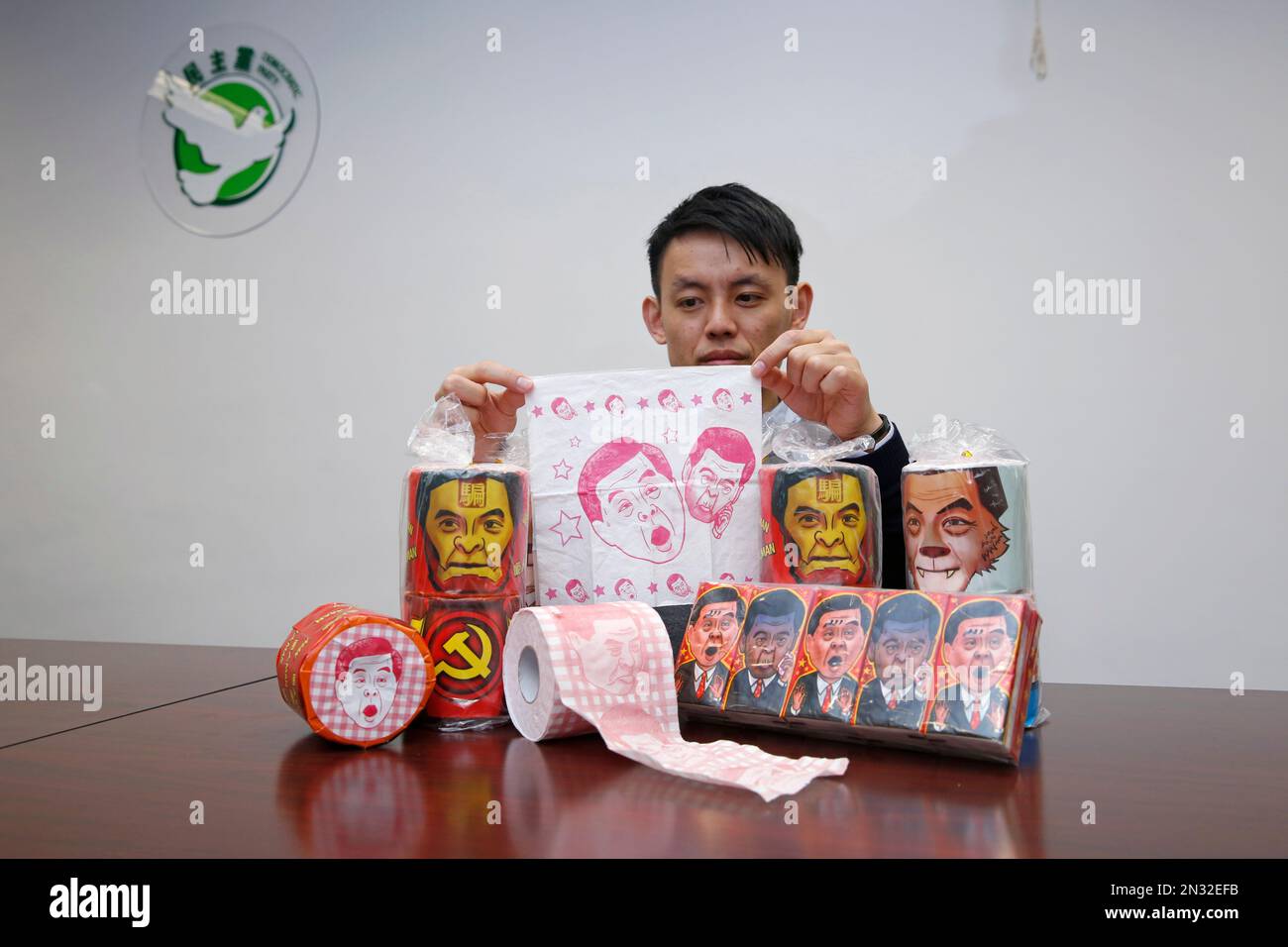 Hong Kong Democratic Party Vice Chairman Lo Kin-hei poses with rolls of ...