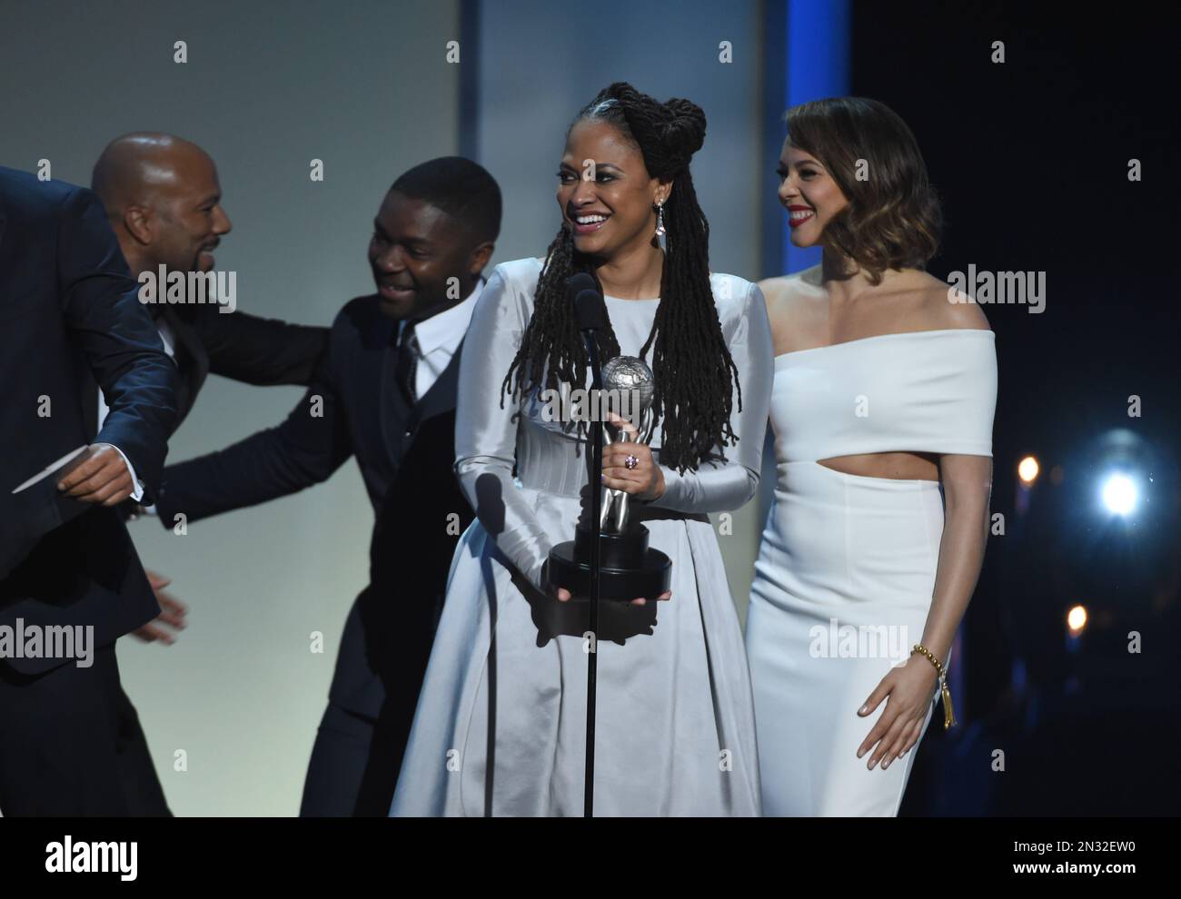 Ava DuVernay, center, and the cast and crew of “Selma” accept the award ...