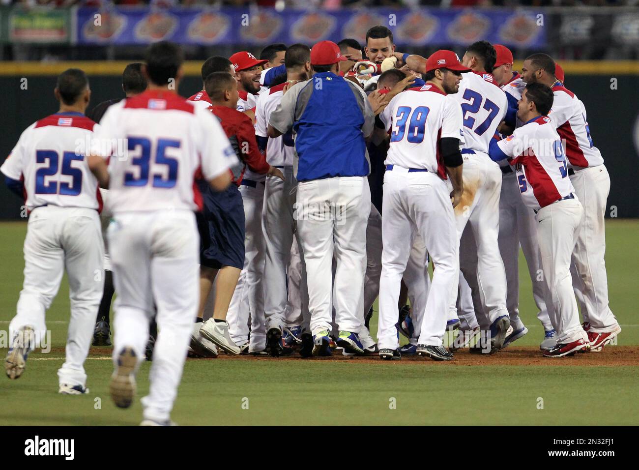 Puerto Rico players celebrate their victory over Dominican Republic at ...