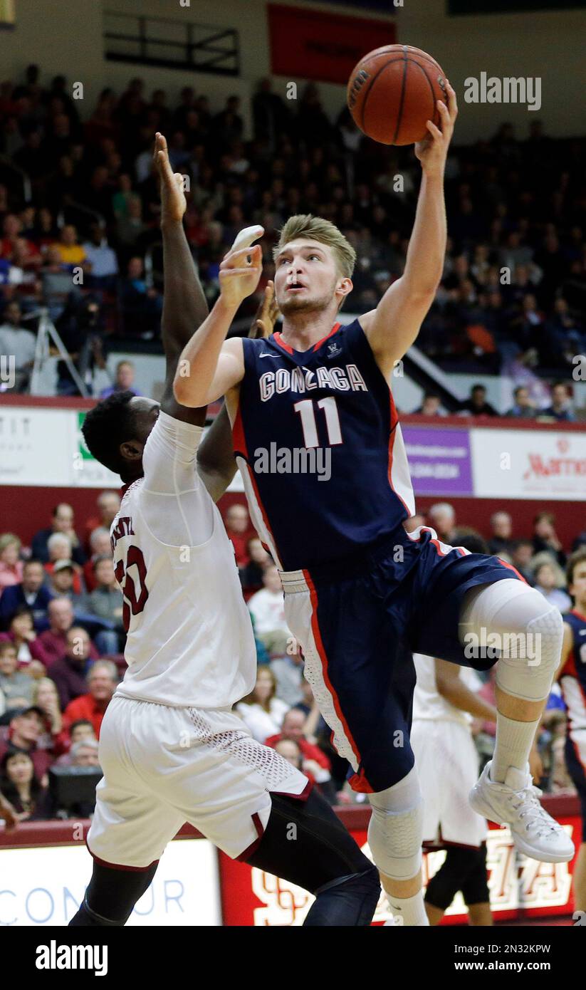 Gonzaga's Domantas Sabonis shoots over Santa Clara's Emmanuel Ndumanya (50) during the first ...