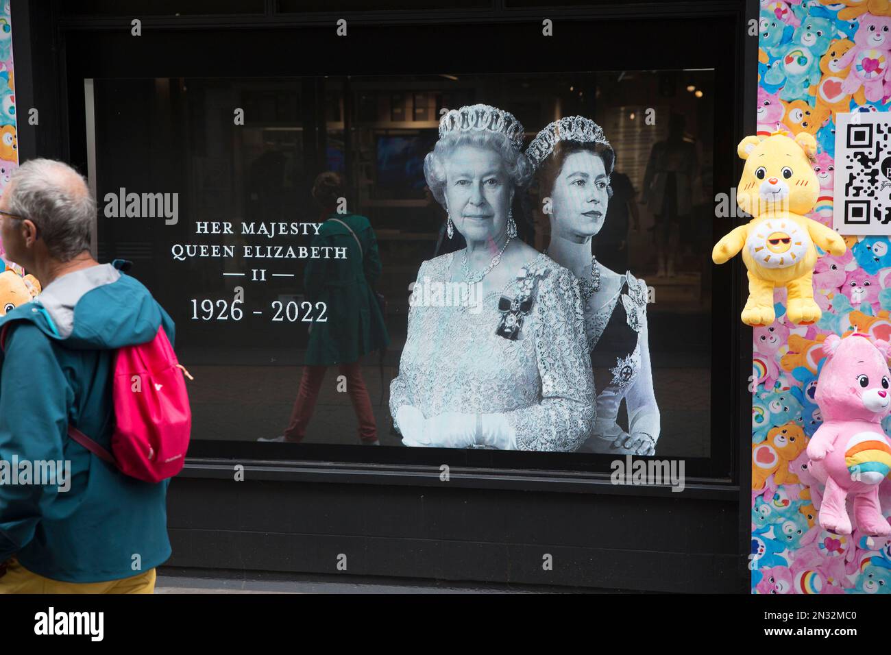 Portraits of Queen Elizabeth II are displayed in a shop window in ...