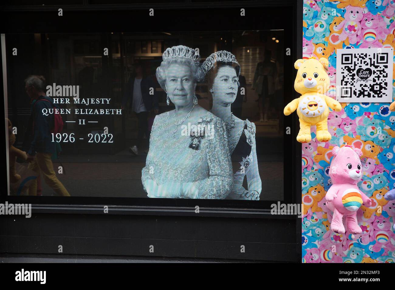Portraits of Queen Elizabeth II are displayed in a shop window in ...
