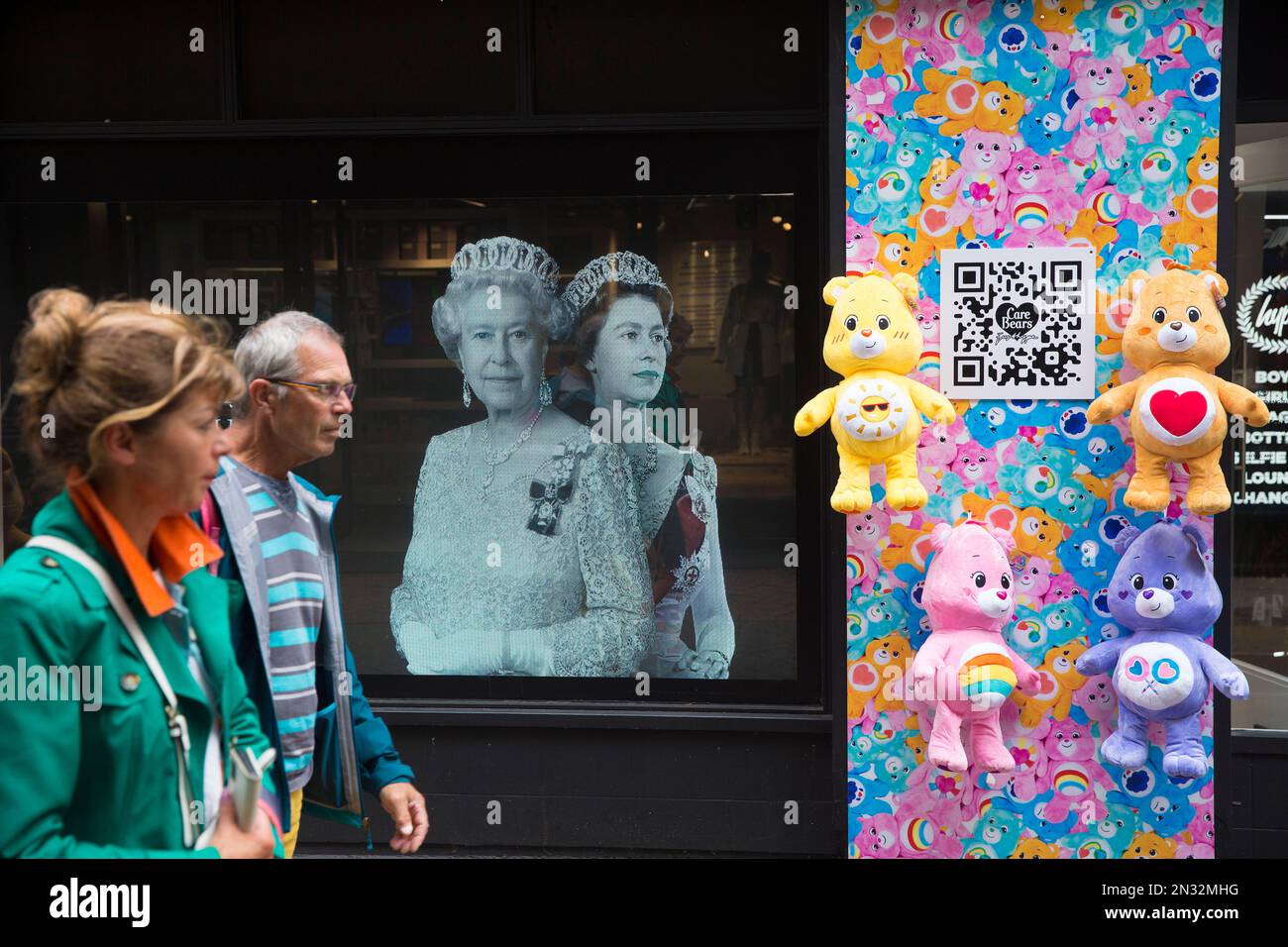 Portraits of Queen Elizabeth II are displayed in a shop window in ...