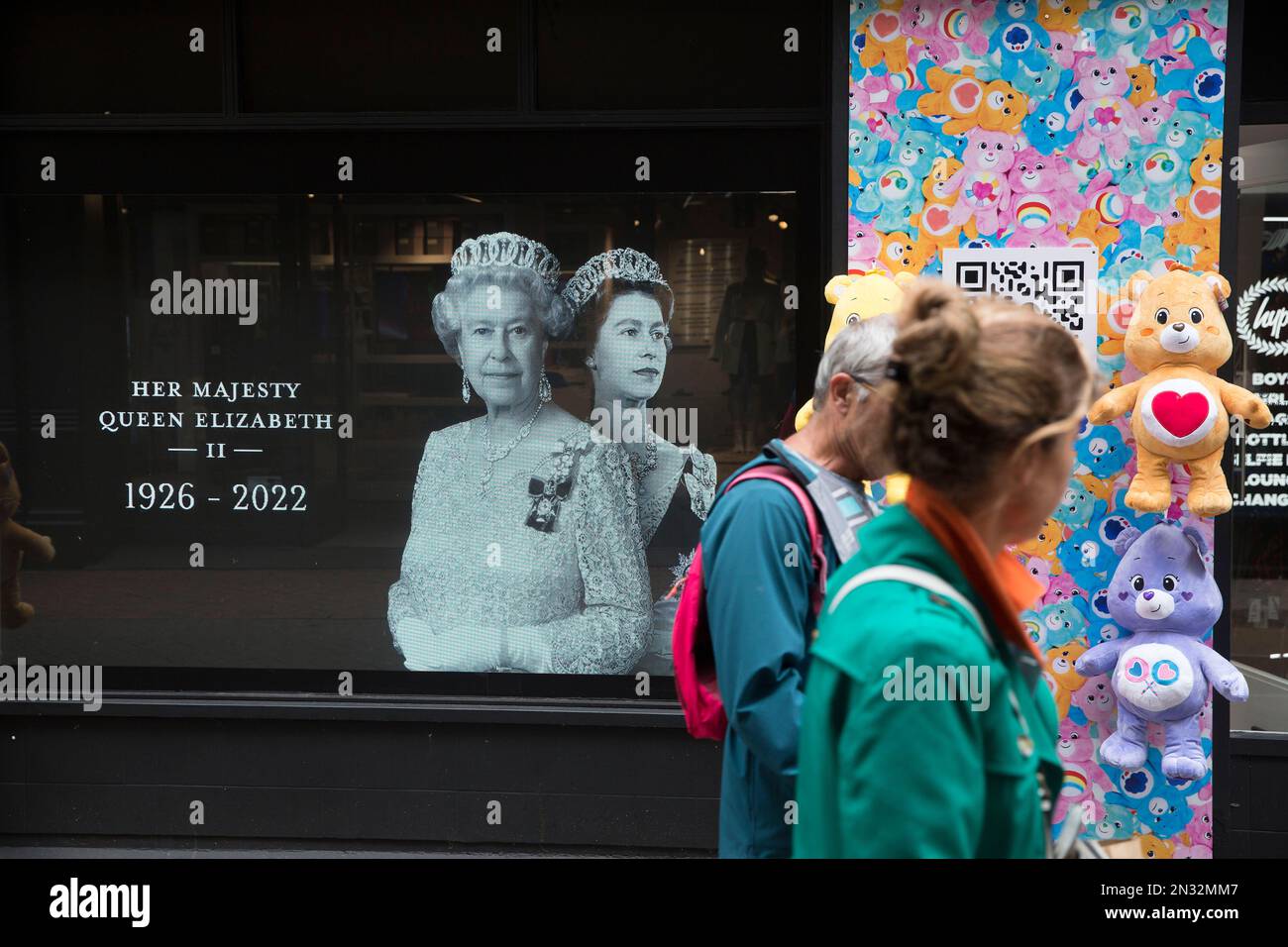 Portraits of Queen Elizabeth II are displayed in a shop window in ...