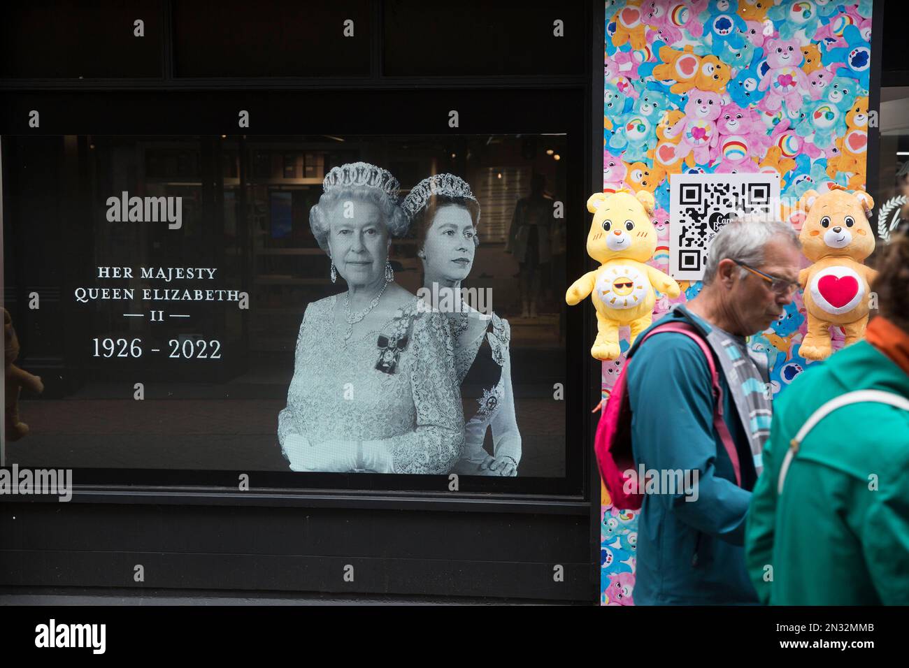 Portraits of Queen Elizabeth II are displayed in a shop window in ...