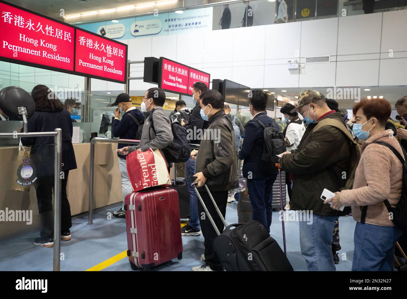 Travelers wait for the gate to open at Lo Wu Control Point on the first ...