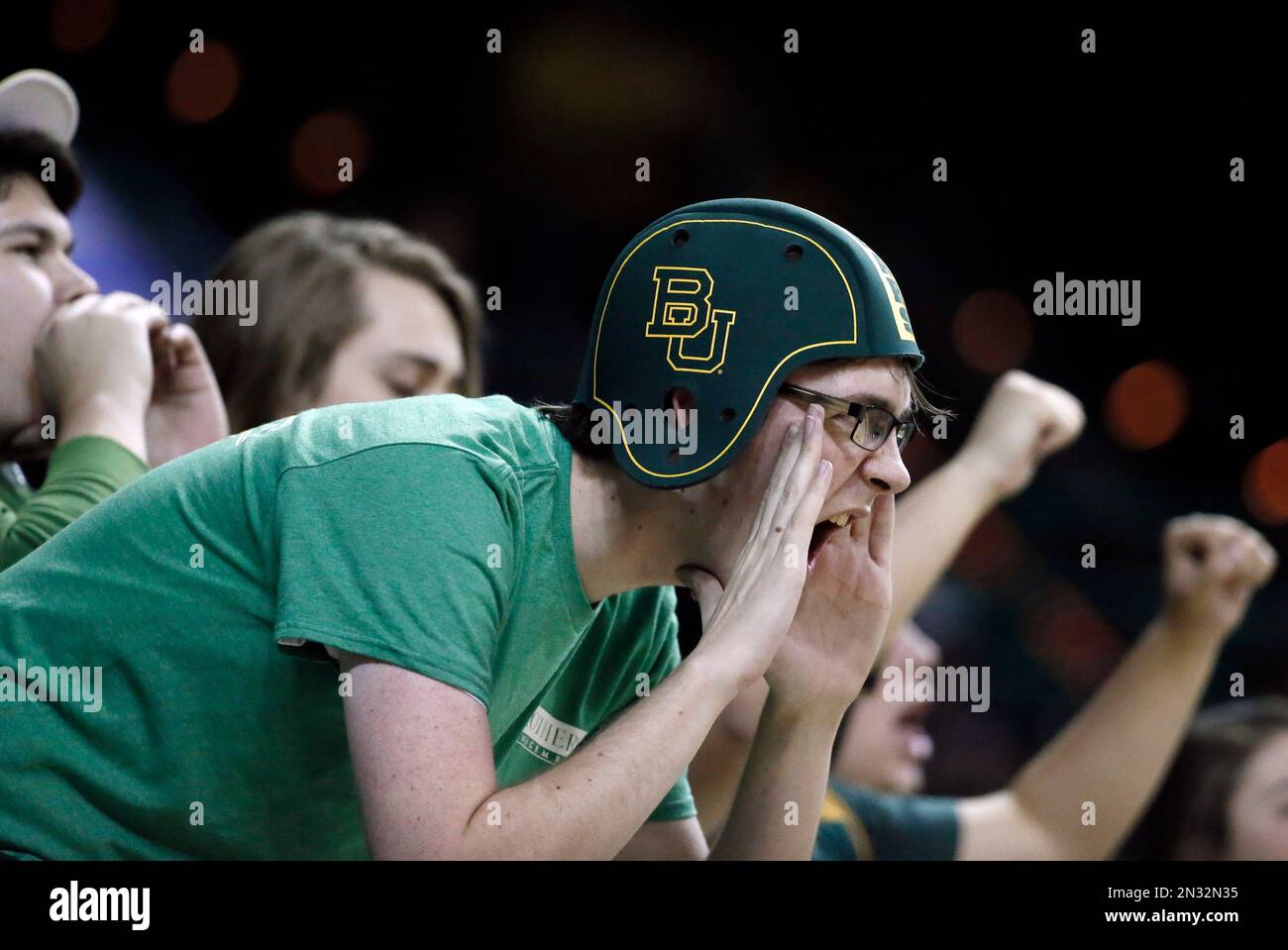 Baylor fans cheer on their team during an NCAA college basketball game ...