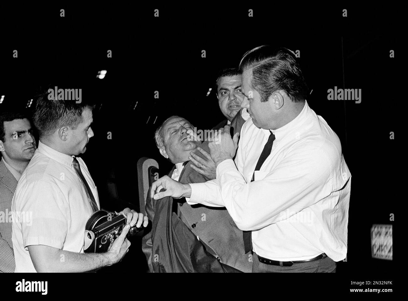 New Orleans underworld figure Carlos Marcello lets fly with a left ...