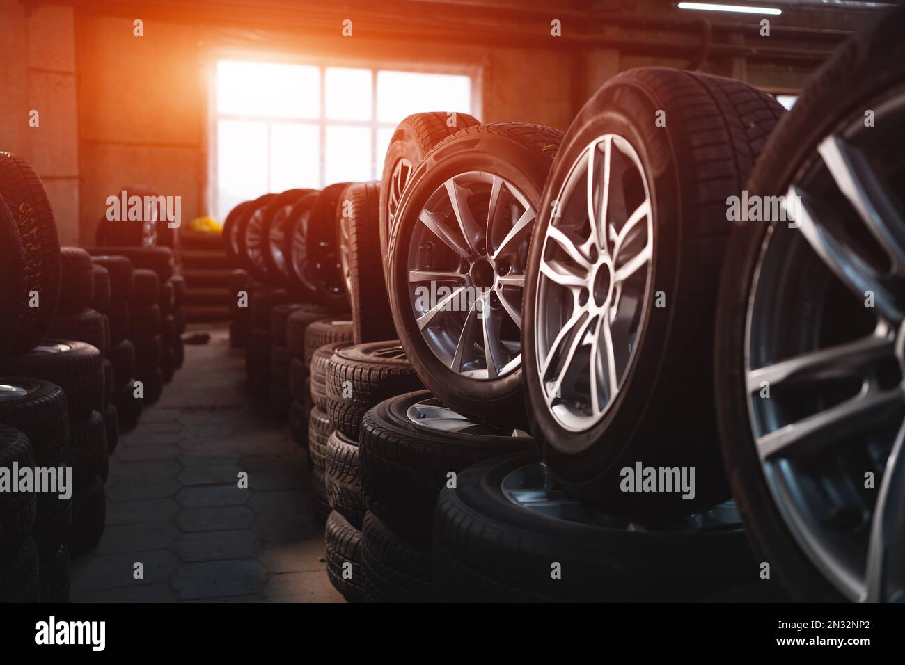 modern warehouse with stack of car tires Stock Photo - Alamy