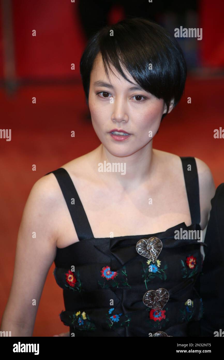 Japanese actress Rinko Kikuchi poses for photographers upon arrival at ...
