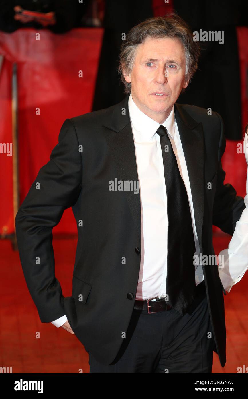 Irish actor Gabriel Byrne poses for photographers upon arrival at the ...