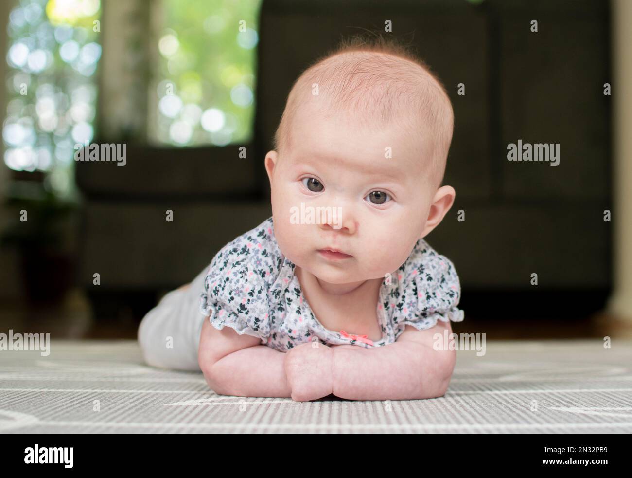 Baby development milestones hi-res stock photography and images - Alamy