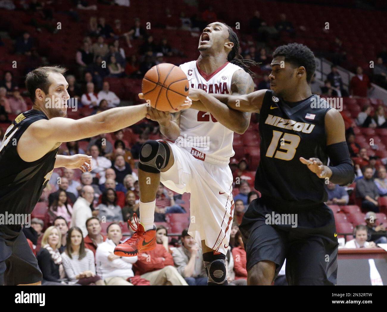 Alabama guard Levi Randolph (20) is fouled by Missouri guard Montaque ...