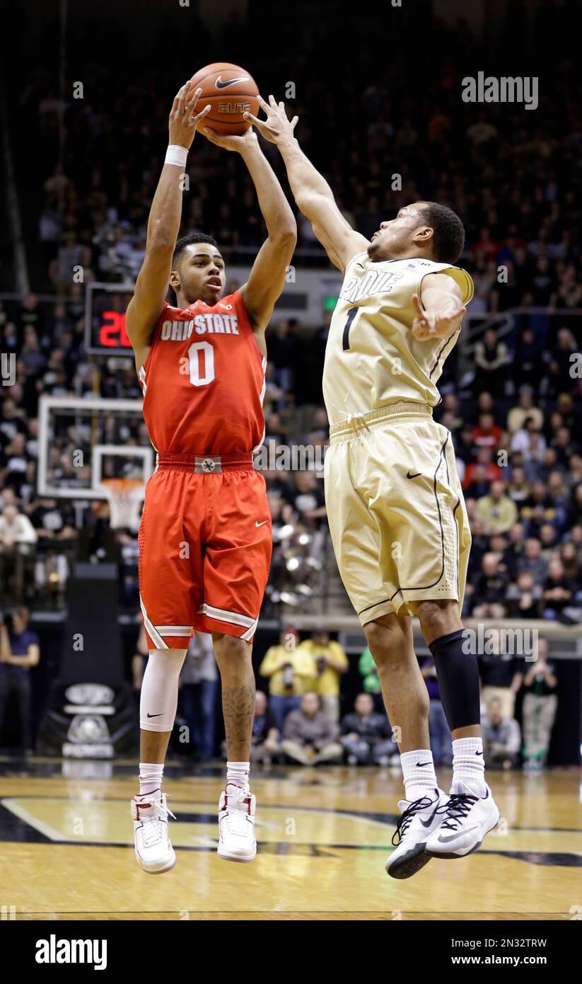 Ohio State guard D'Angelo Russell (0) shoots over Purdue guard Bryson ...