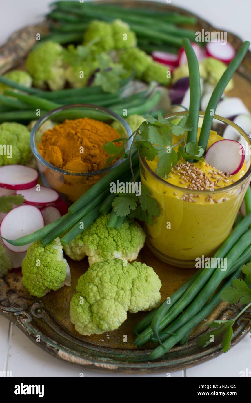 This Jan. 12, 2015 photo shows golden turmeric dip with crudite in ...