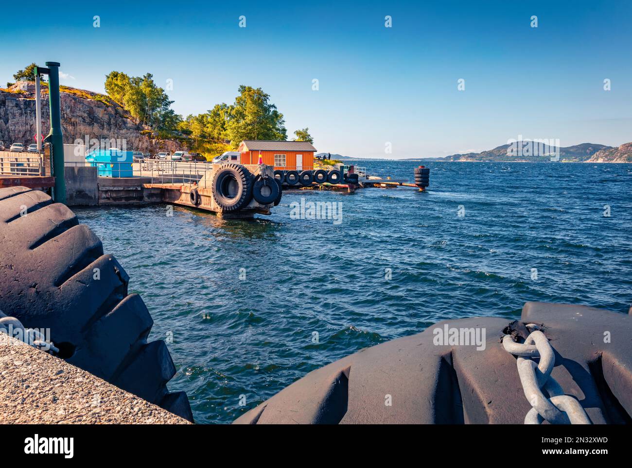 Landscape photography. Picturesque summer view of small Norwegian farry ...
