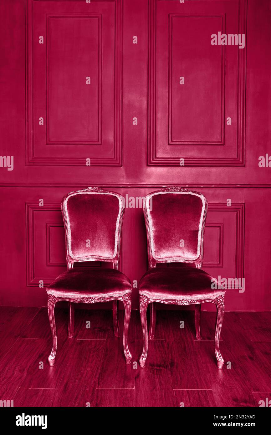Two old wooden pink chairs hi-res stock photography and images - Alamy