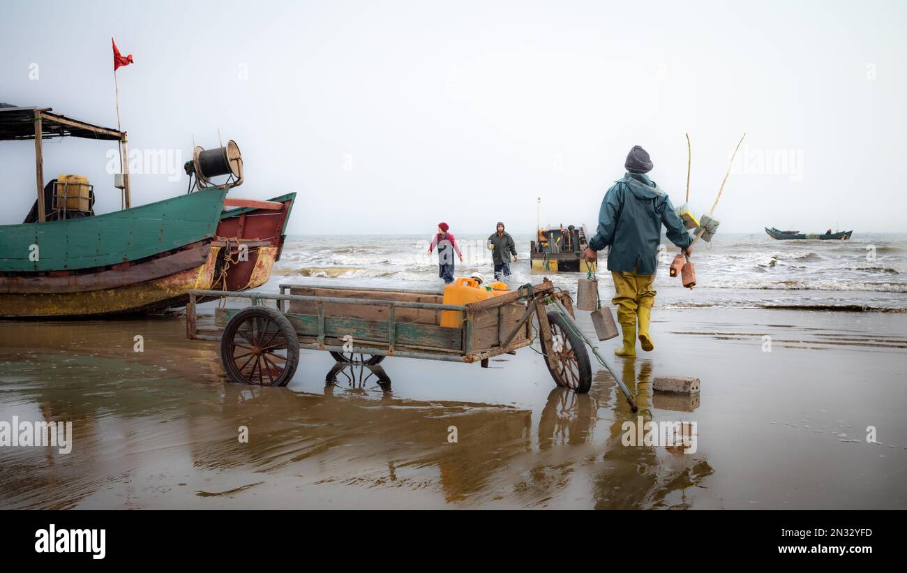 A fisherman at Tra Co beach in northern Vietnam on the China border ...