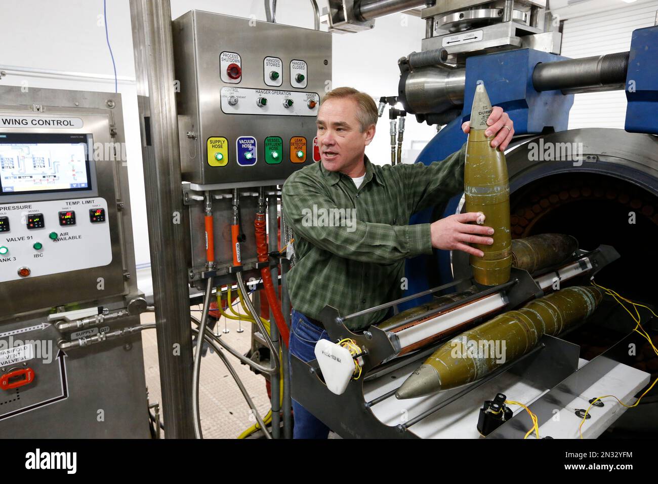 In this Jan. 29, 2015 photo, project manager Steve Bird holds an inert ...