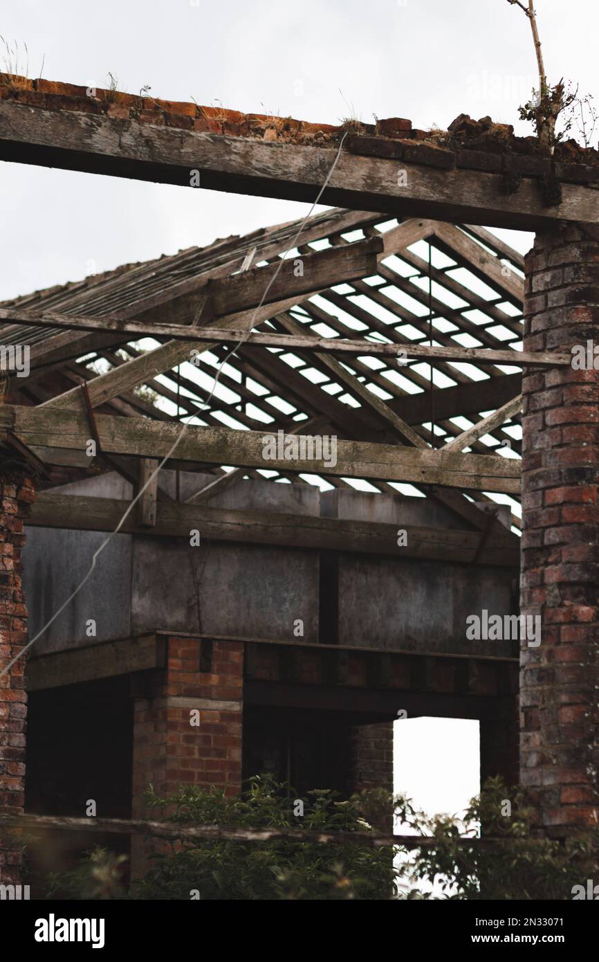 A vertical shot of ruined buildings adjacent to Barton Aerodrome ...