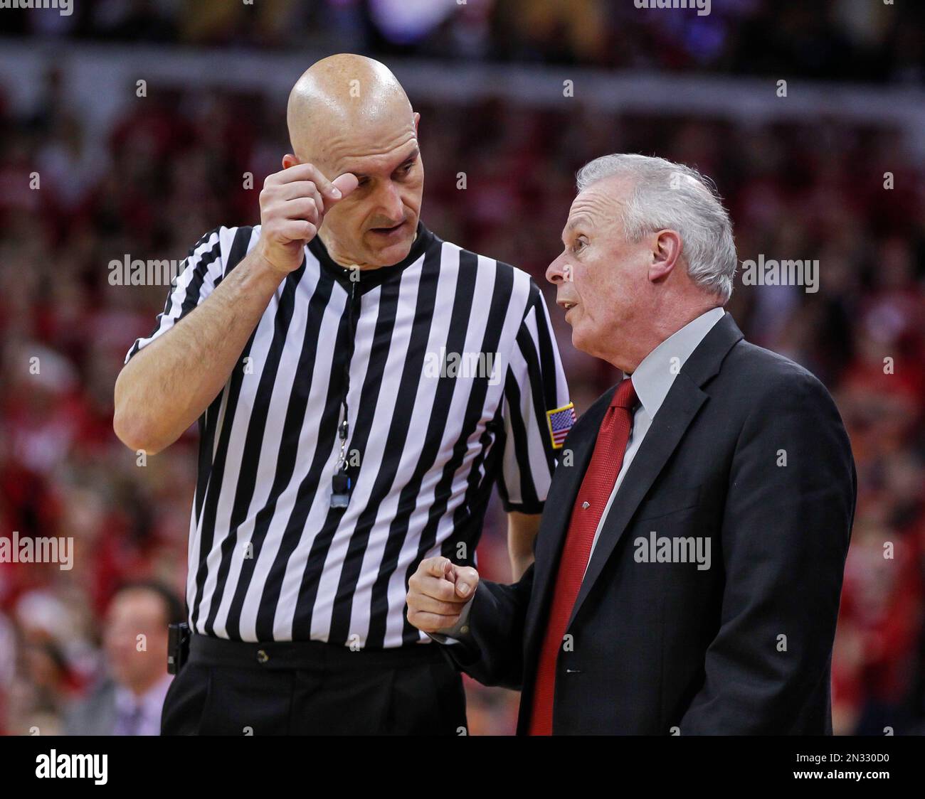 Wisconsin coach Bo Ryan talks with official D.J. Carstensen during the ... Wisconsin coach Bo Ryan talks with official D.J. Carstensen during the ...