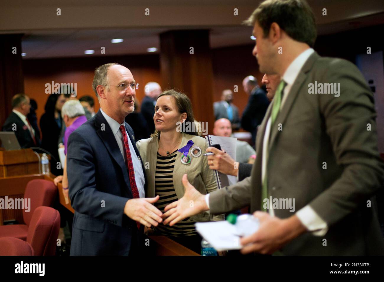 State Rep. Allen Peake, R-Macon, left, talks with Jesse Stanley, Vice ...