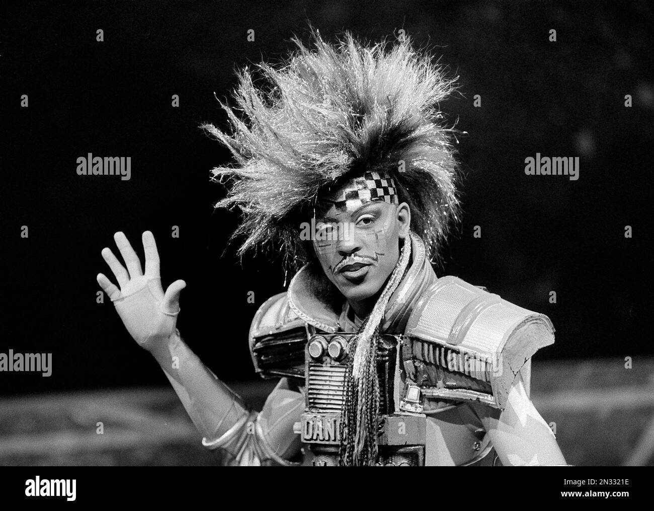 Jeffrey Daniel sports a spectacular costume and colorful hairstyle for ...