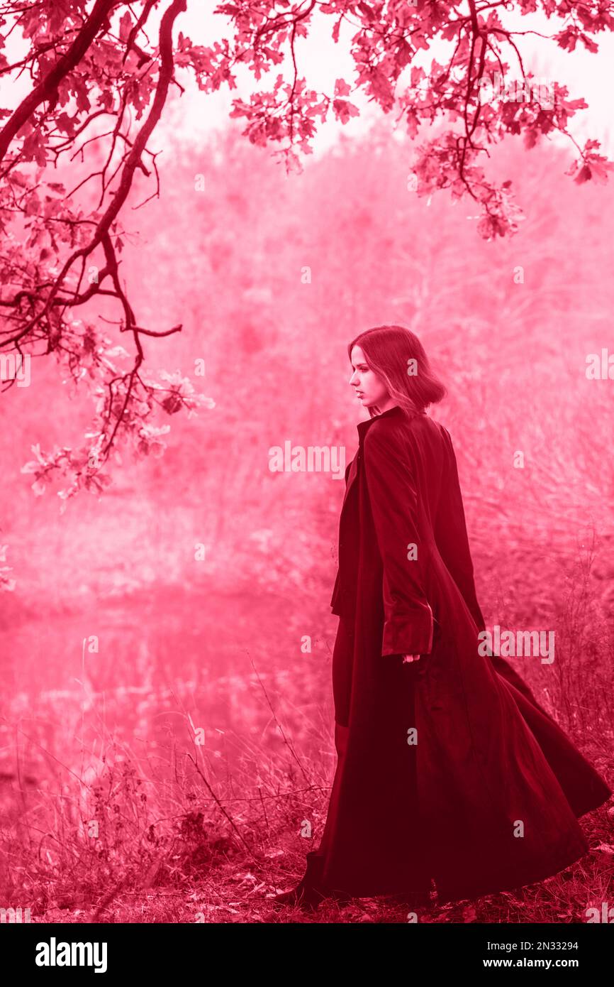 Woman coat back view windy hi-res stock photography and images - Alamy