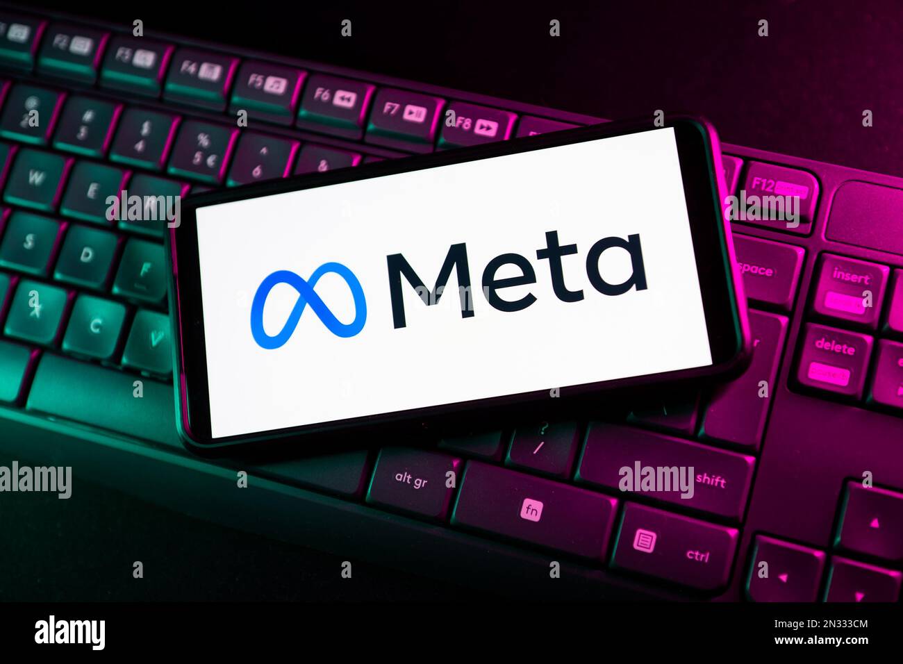 In this photo illustration a Meta logo seen displayed on a smartphone ...