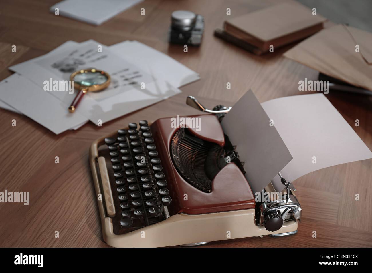Typewriter, fingerprints and papers on desk. Detective's workplace ...