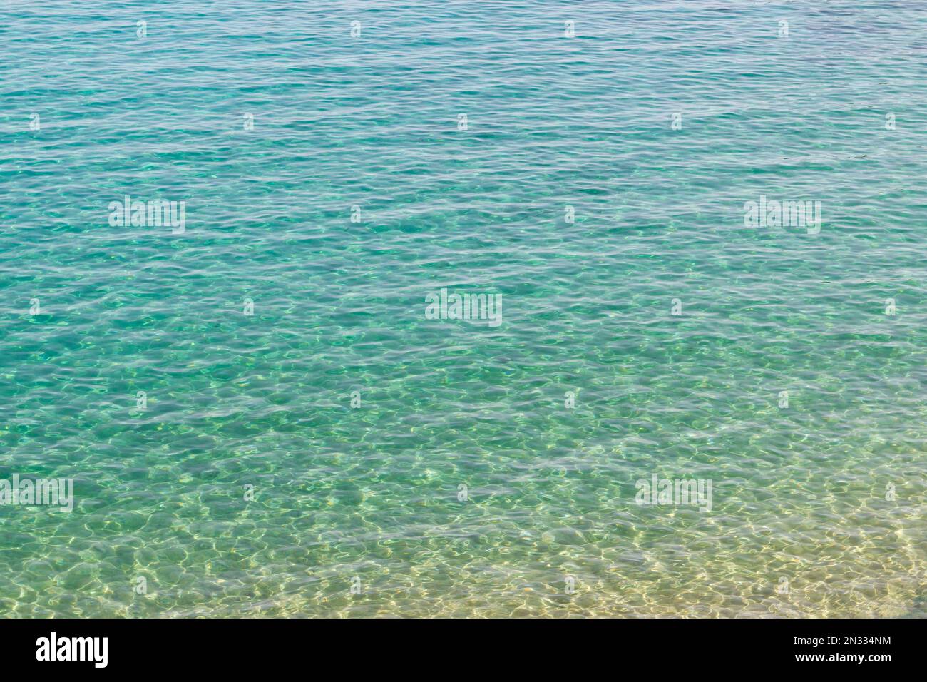 Taransparent azur blue sea water Stock Photo - Alamy