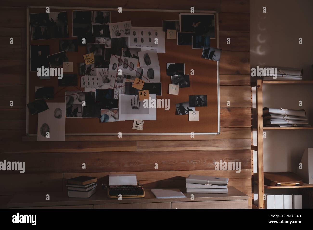 Detective office interior with evidence board on wall Stock Photo - Alamy