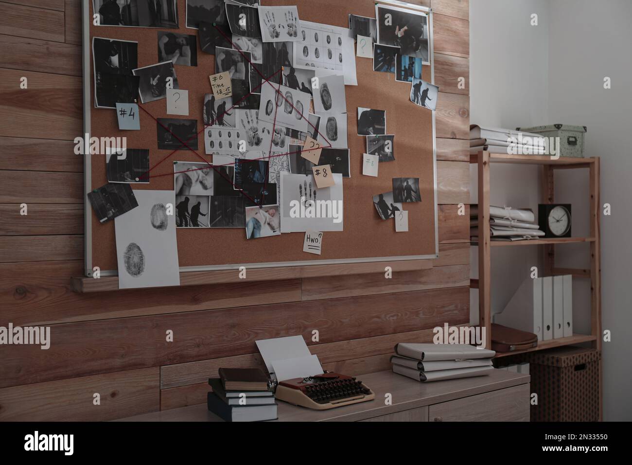 Detective office interior with evidence board on wall Stock Photo - Alamy